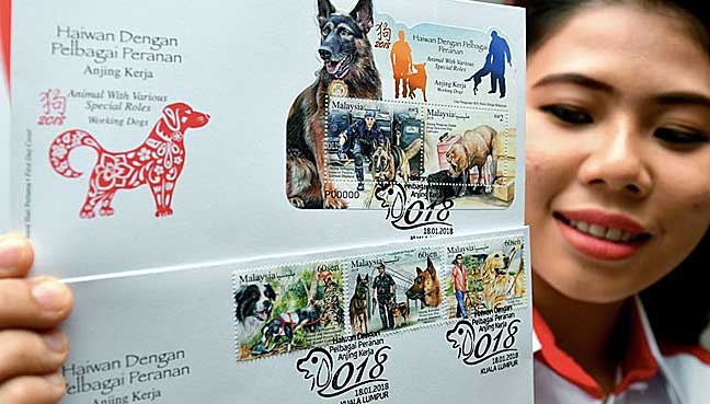 Pos Malaysia terbit setem tema anjing | FMT