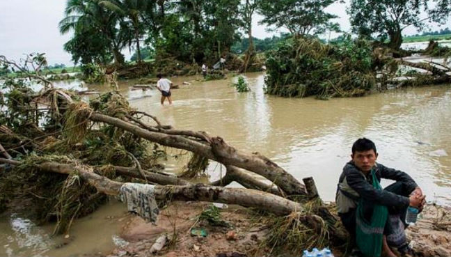 Rescuers struggle to reach stranded in Myanmar dam flooding | Free ...