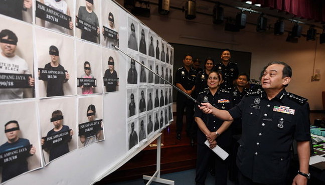 Police cripple 2 ‘Macau scam’ syndicates in Selangor | FMT