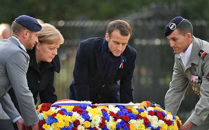 Leaders of France and Germany in poignant show of unity 100 years after ...