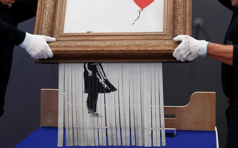Self-shredding Banksy painting goes on display in Germany | Free ...
