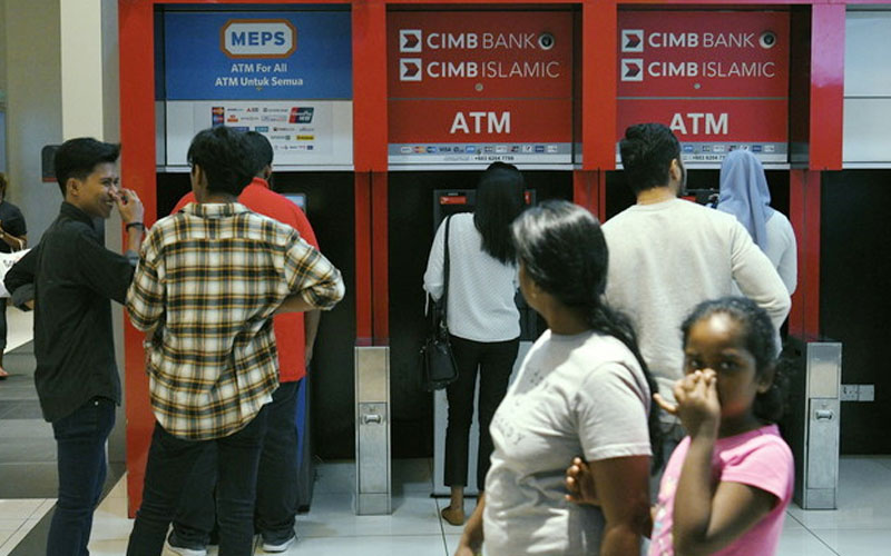 Think again on RM1 ATM fee, Umno Youth tells govt | FMT