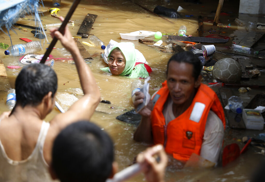 Thousands in shelters as Indonesia flood death toll hits 60 | Free ...