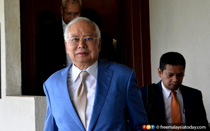 Nik Faisal remained as SRC director to ensure continuity, Najib tells ...