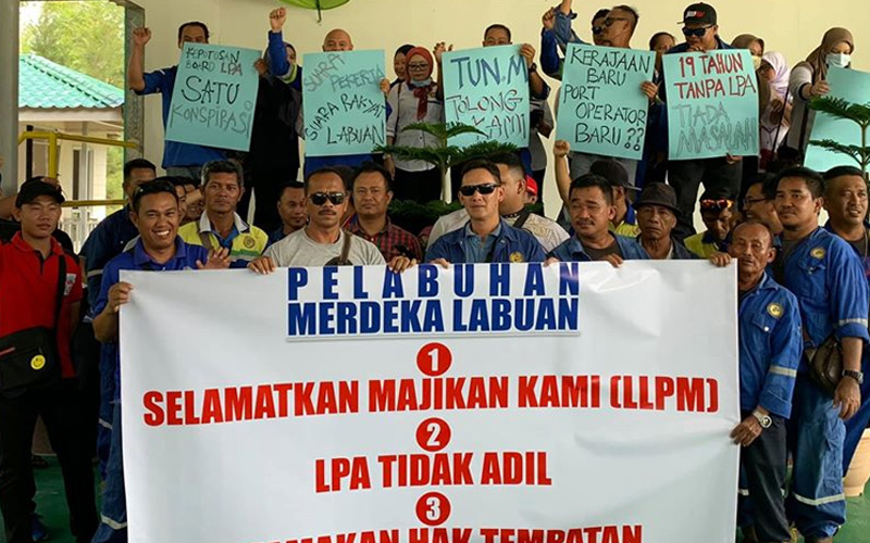 Lebih 100 pekerja pelabuhan Labuan berpiket bantah pengendali baru | FMT