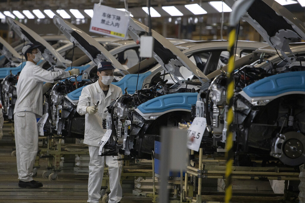 China’s factory activity quickens but pandemic drags exporters ...