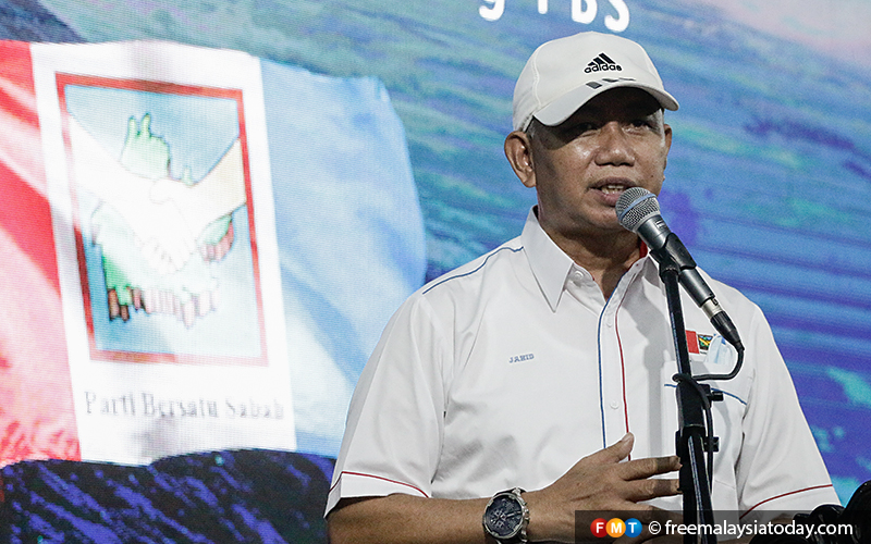 Sabah minister Jahid Jahim faints while making a speech | FMT