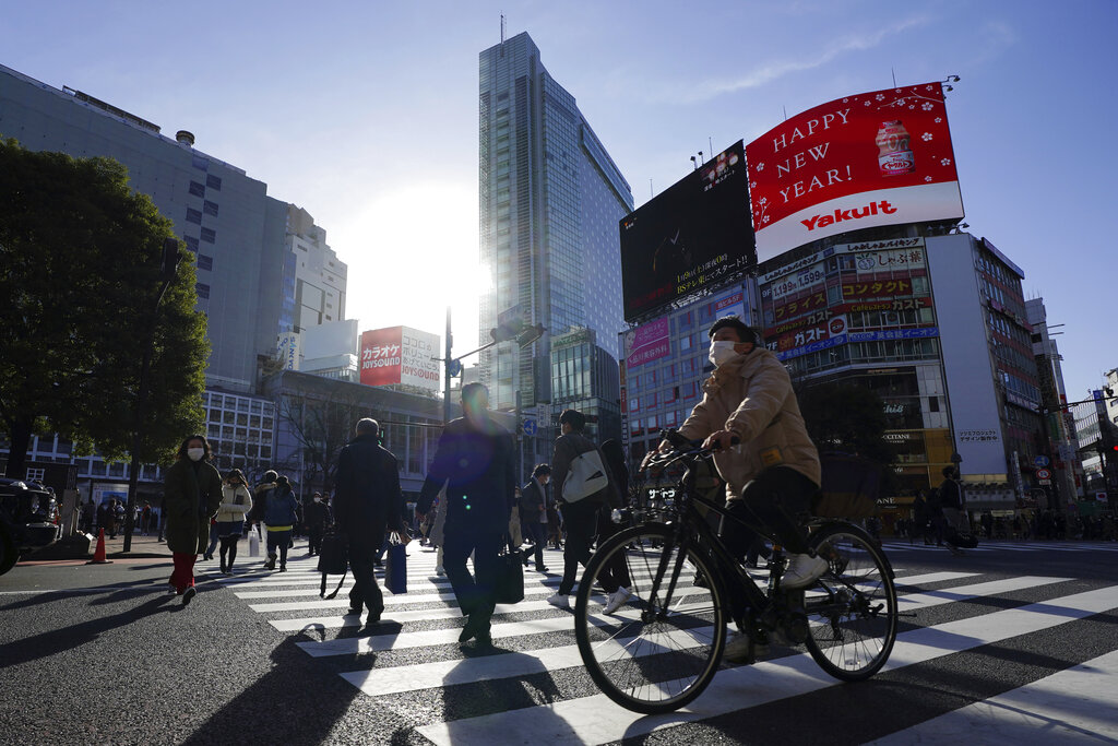 Despite fewer cases, Japan extends Tokyo emergency by a fortnight ...