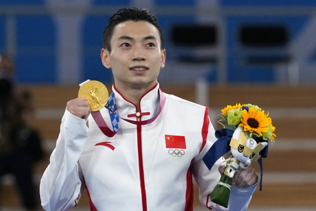 China’s Zou Jingyuan wins parallel bars Olympic gold | Free Malaysia ...