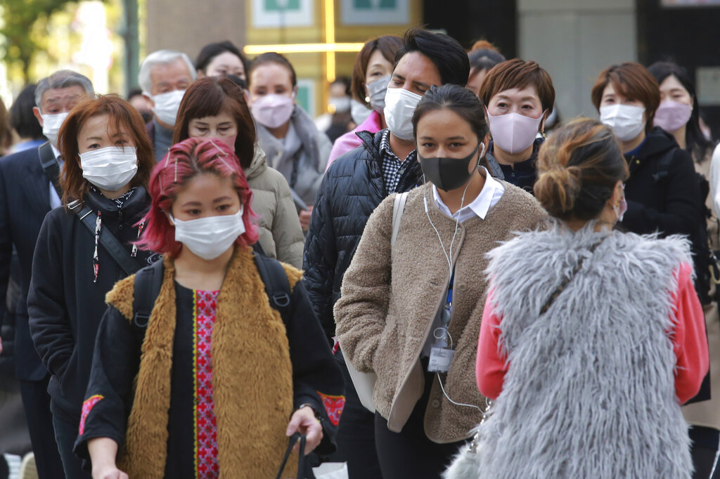 Japan scientists develop glowing masks to help detect Covid | FMT