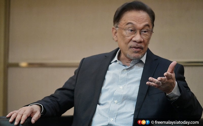 Anwar slams ‘say little, do less’ PM over media control | FMT
