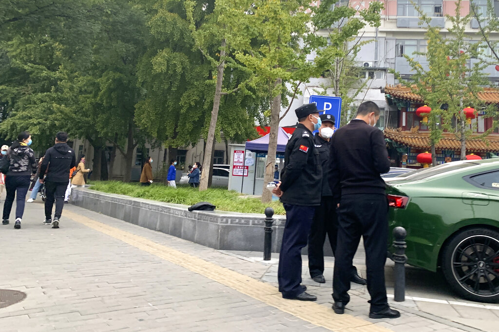 China removes rare political protest banners in Beijing | FMT