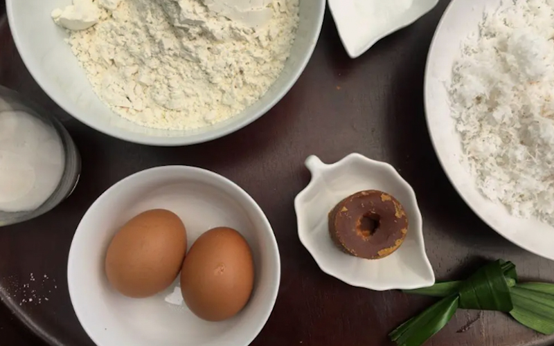 Dainty Malaysian crepes with sweet coconut filling | Free Malaysia ...