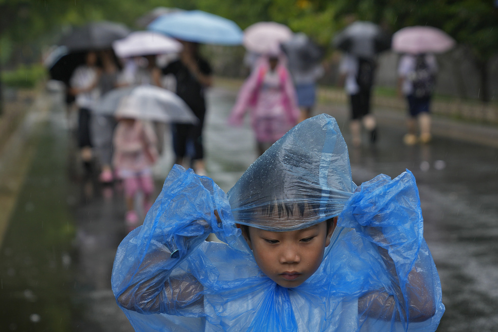 Thousands flee homes as heavy rain lashes Beijing | FMT