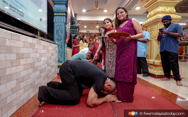 Nepalis bring comfort to migrant workers with family ritual | Free ...