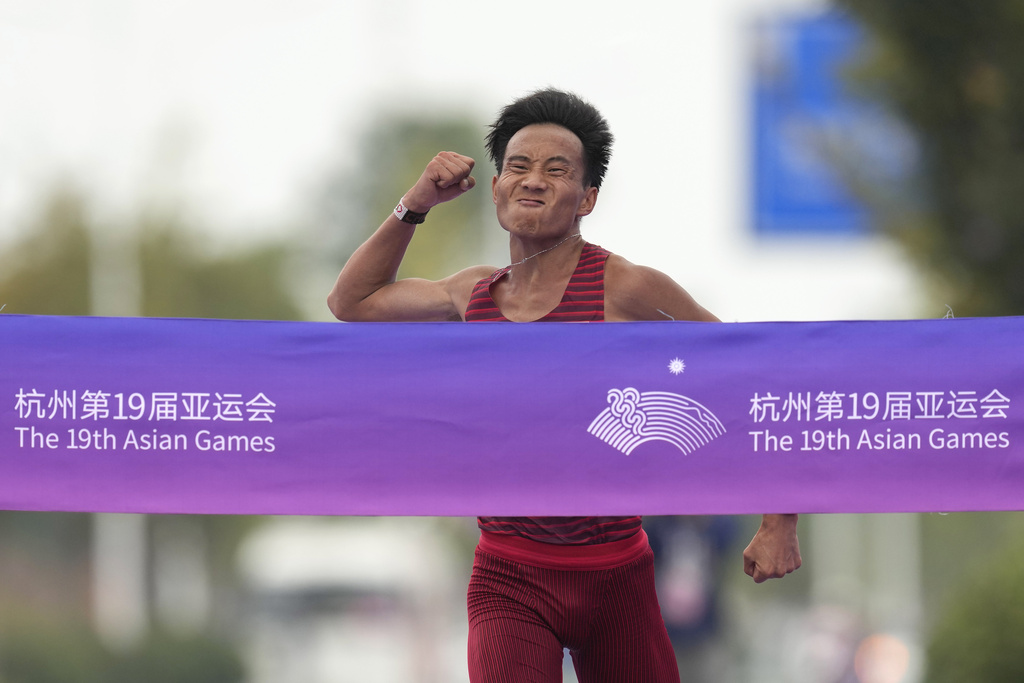 China’s He wins Asian Games marathon, Chuma claims women’s gold | FMT