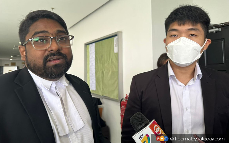 Court sets aside activist’s DNAA for recording police raid | FMT