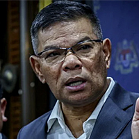 Minister defends immigration officer’s query on language proficiency | FMT