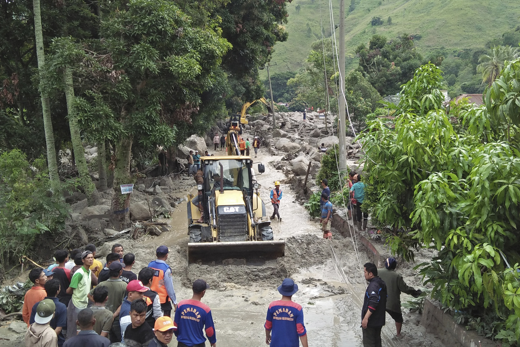 2 dead, 10 missing after Indonesian floods and landslide | FMT