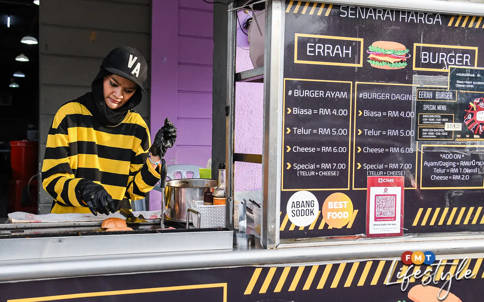 Eerah rises above her disabilities to sell burgers | FMT