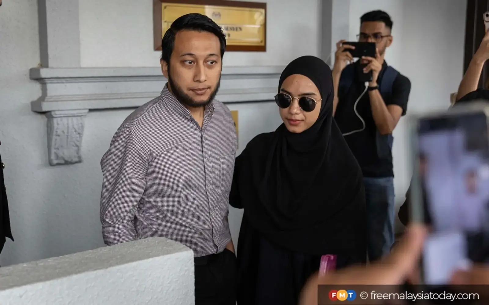 Influencer couple slapped with 10 counts of abuse of public funds | FMT
