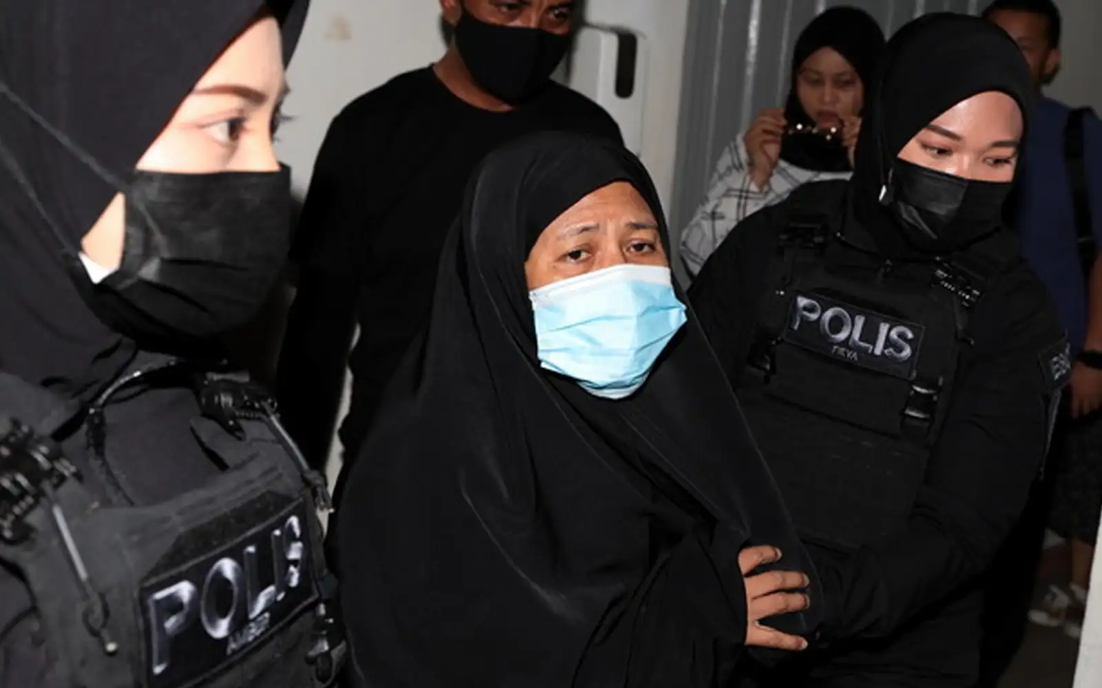 Mum of Ulu Tiram attacker charged with omitting terrorism-related info ...