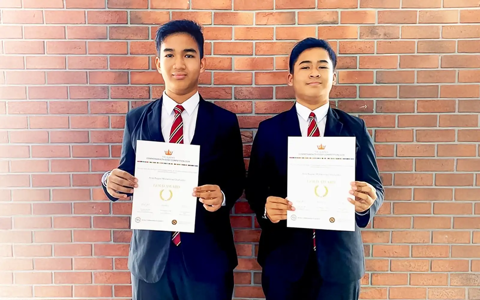 Twins win gold award in Queen’s Commonwealth Essay Competition 2024 | FMT