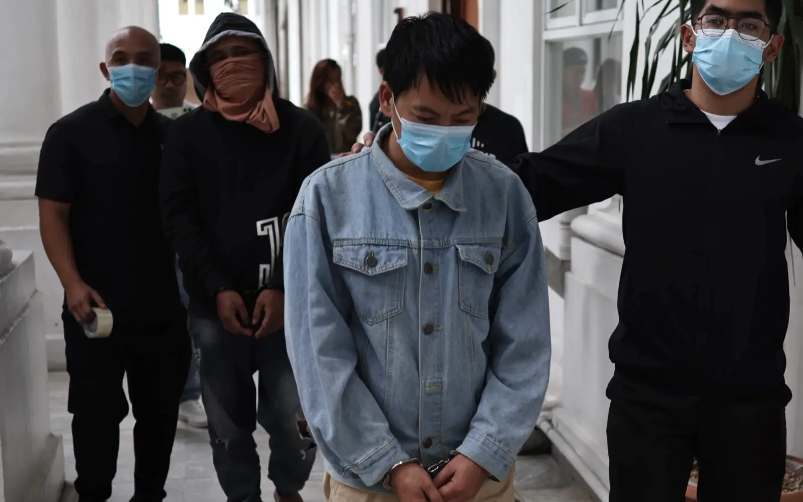 Wife of Chinese national held in Philippines denies he is a spy | FMT