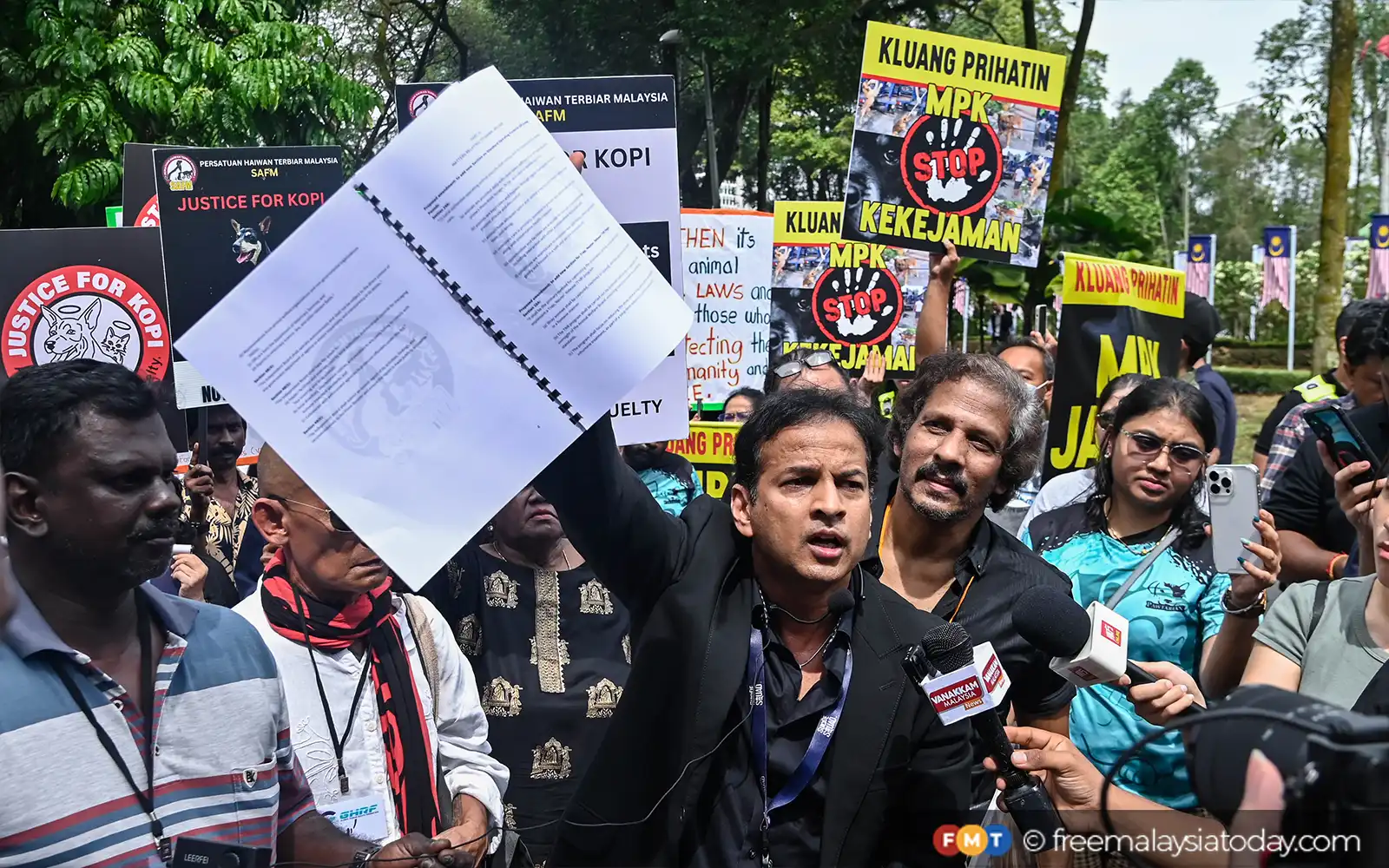 100 rally outside Parliament over cruelty against stray dogs | FMT