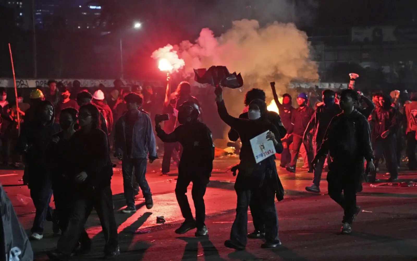 Indonesian cops fire water cannon to break up military law protests | FMT