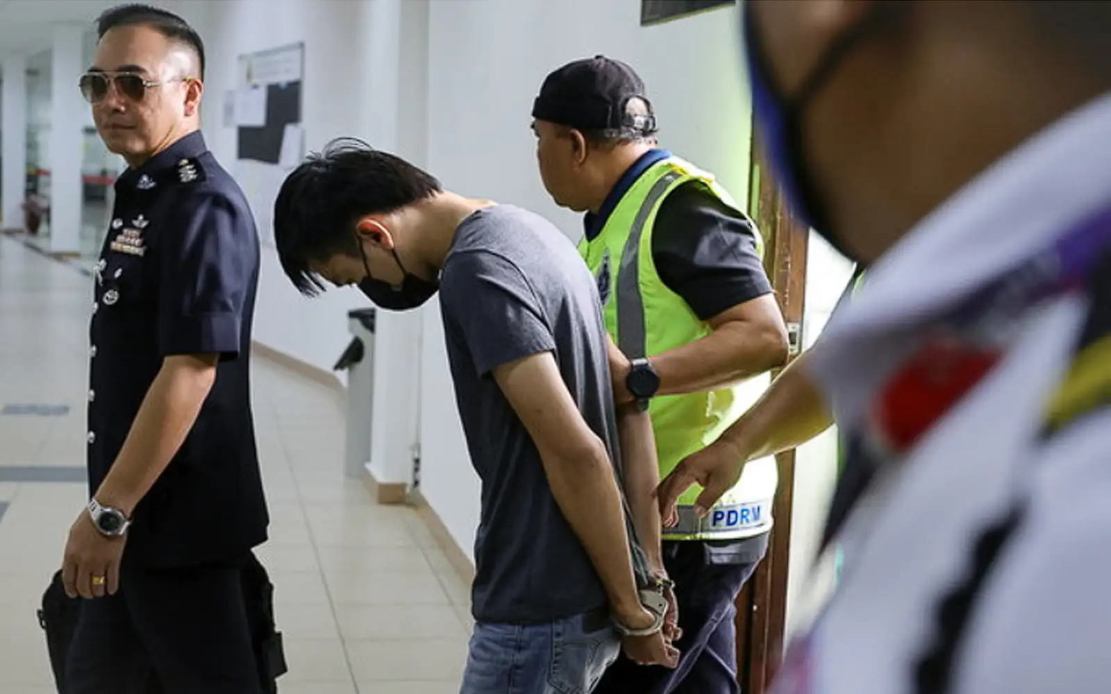Bukit Aman traffic cop in Kuching charged with murder | FMT